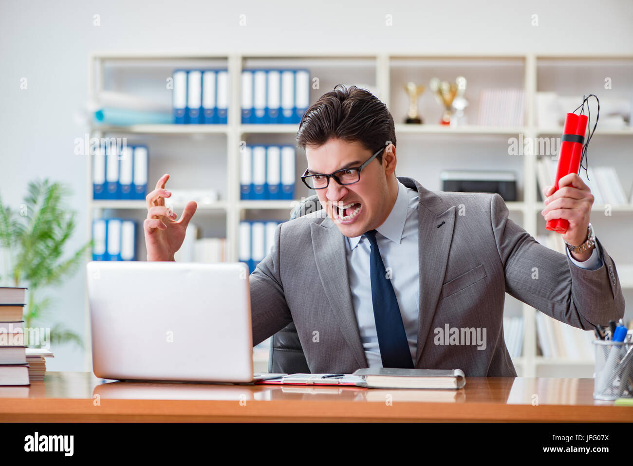 Angry aggressive businessman in the office Stock Photo - Alamy