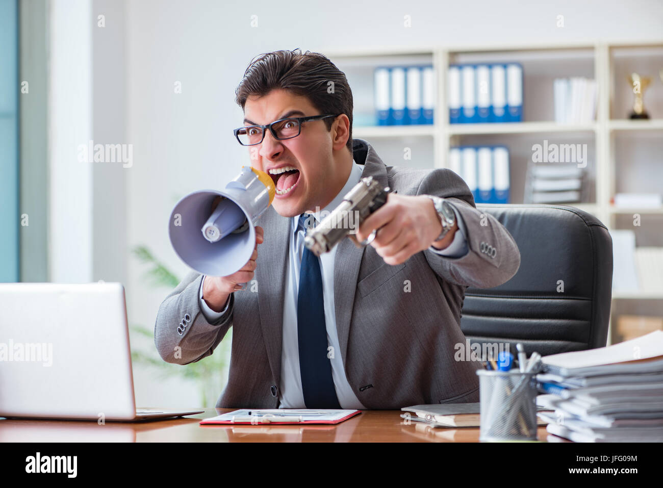 Angry aggressive businessman in the office Stock Photo - Alamy