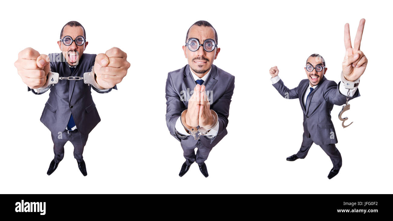 Funny businessman with handcuffs on white Stock Photo - Alamy