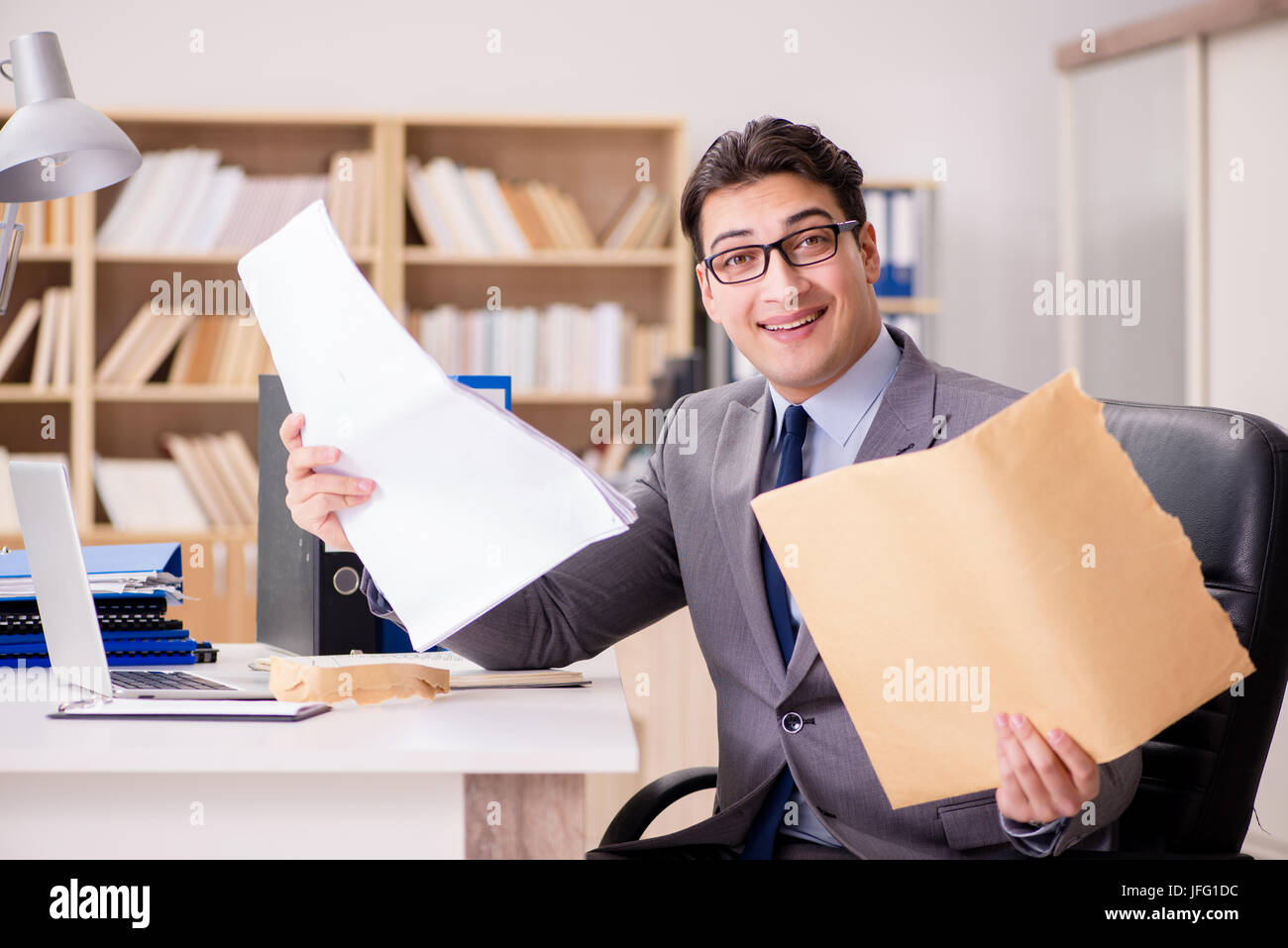 Businessman receiving letter in the office Stock Photo - Alamy