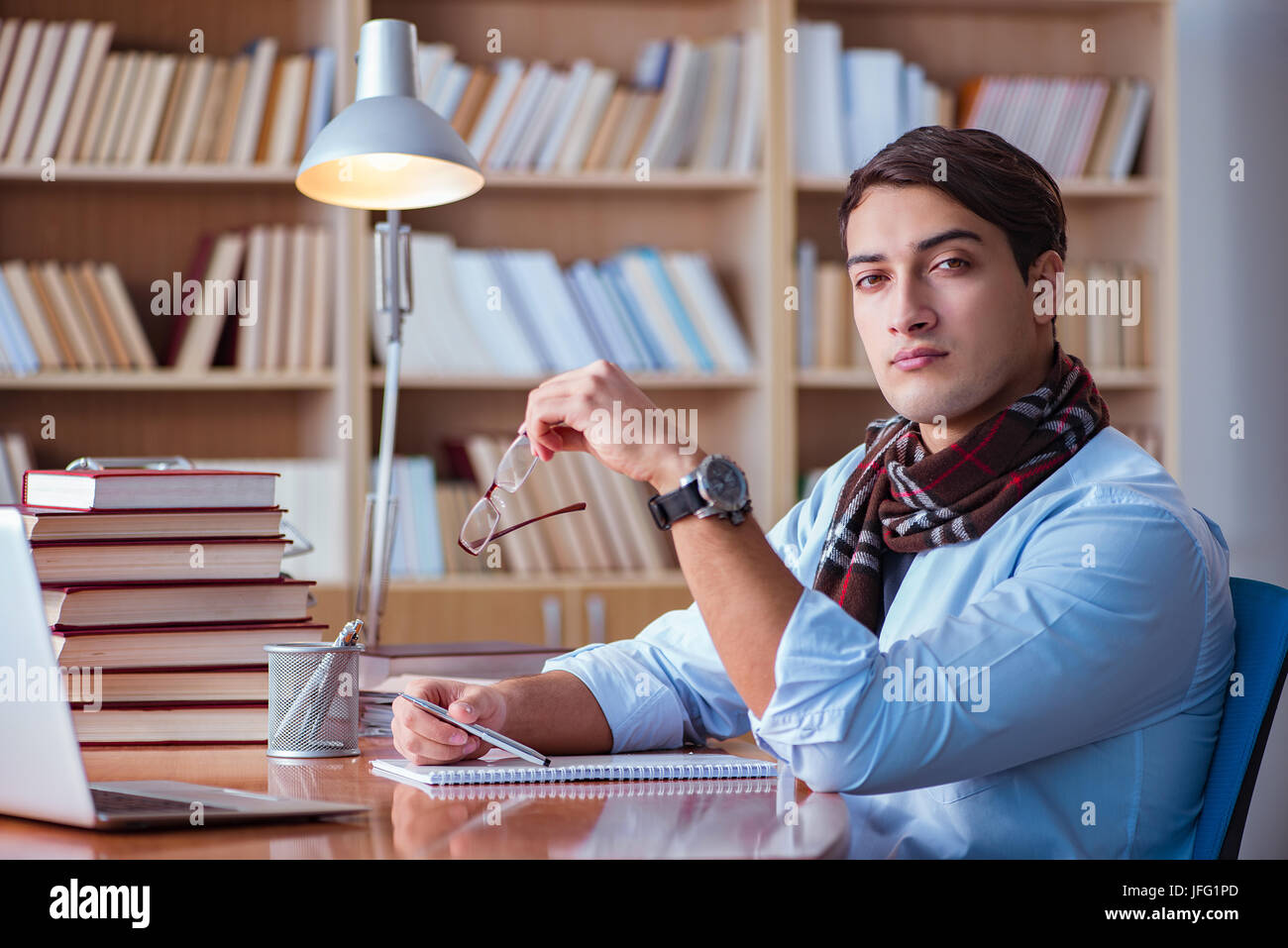 Professional journalist sitting in library hi-res stock photography and ...