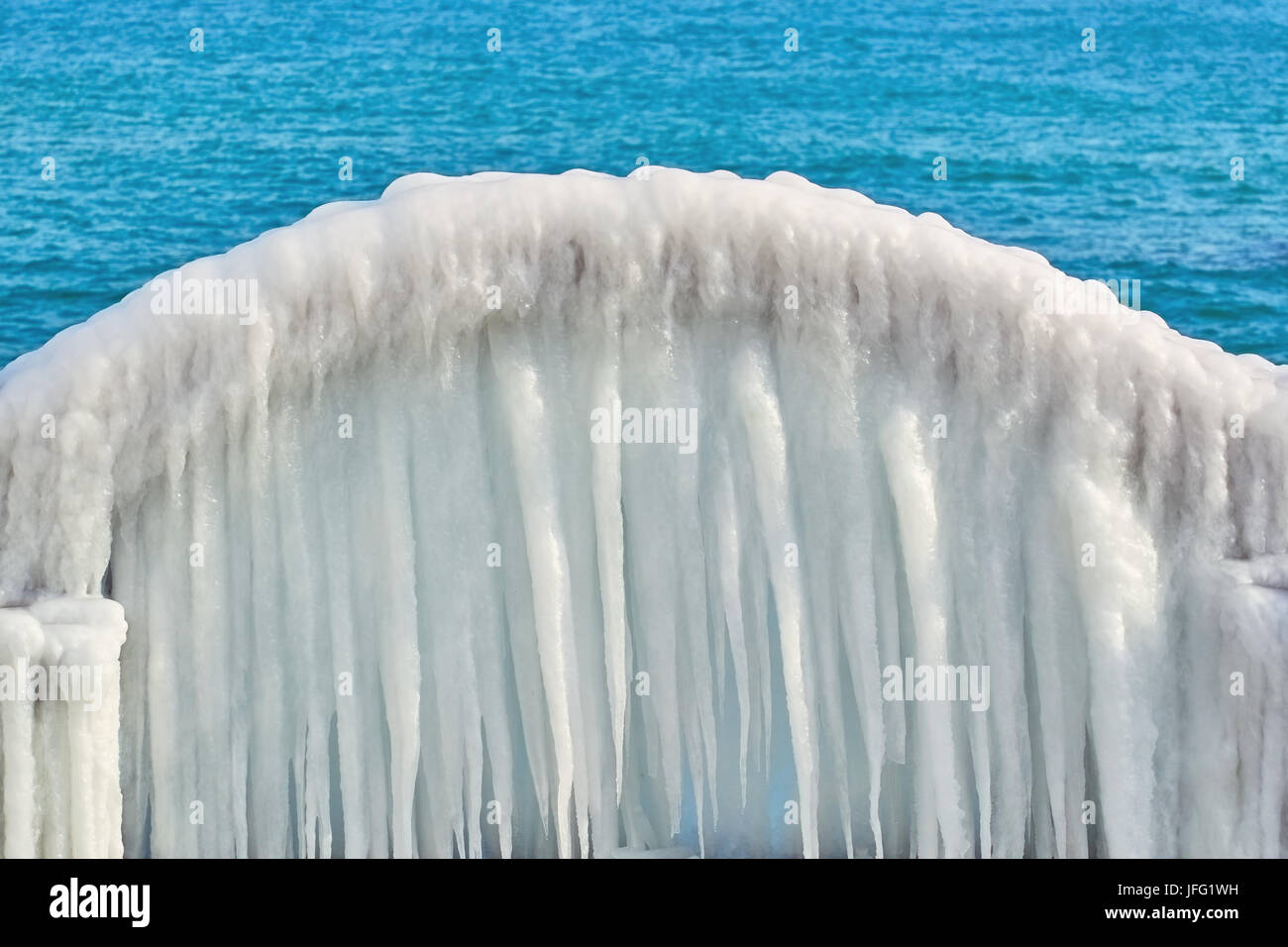 Icy Arch with Icicles Stock Photo - Alamy