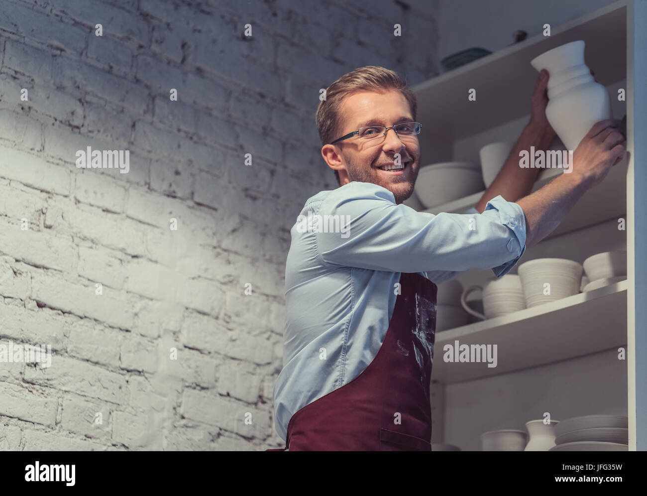 Happy potter hi-res stock photography and images - Alamy