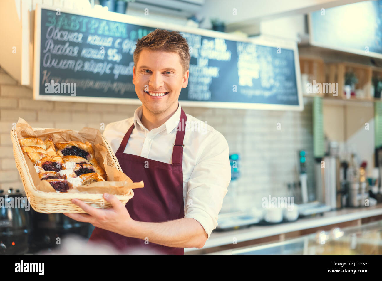Baker in cafe Stock Photo - Alamy