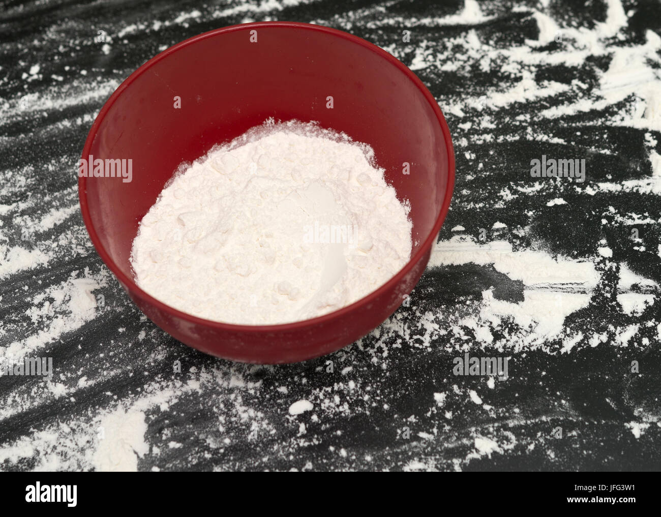 flour in bowl Stock Photo - Alamy