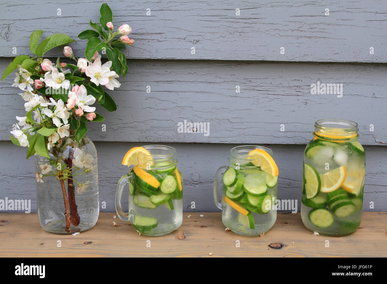 Flavored Cucumber water served in Glass Jars Stock Photo - Alamy
