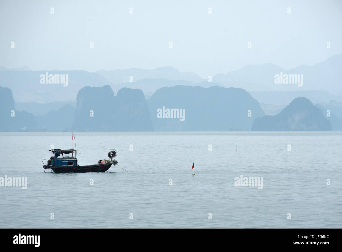 Halong bay and fishing boat hi-res stock photography and images - Alamy