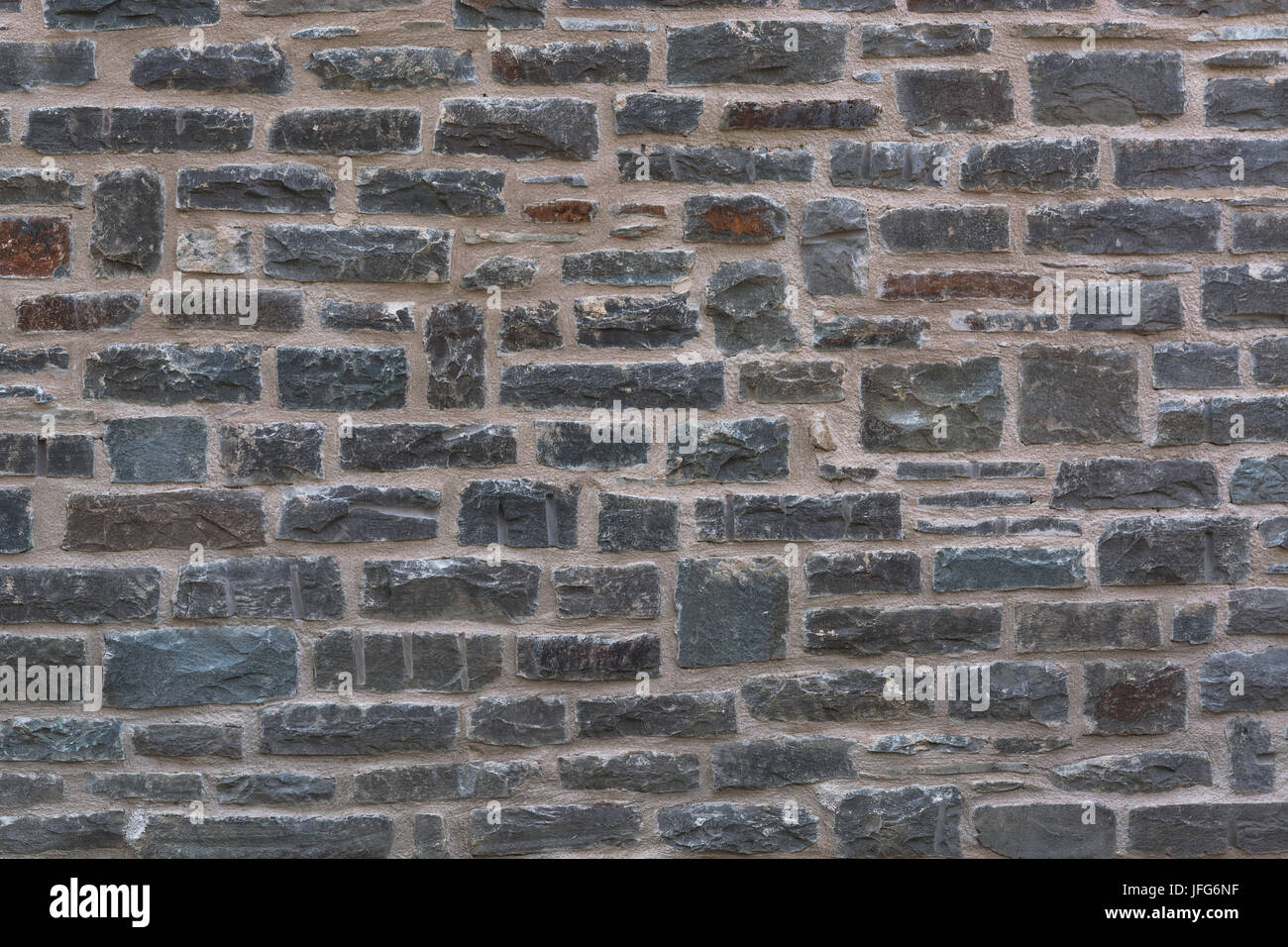 Wall structure of an old stone wall Stock Photo - Alamy