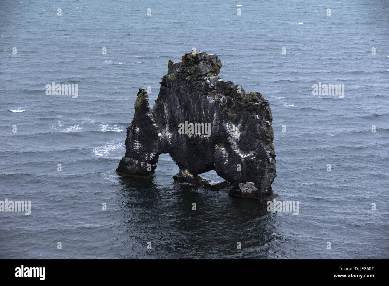 Drinking dragon, exposed rock in Iceland Stock Photo - Alamy