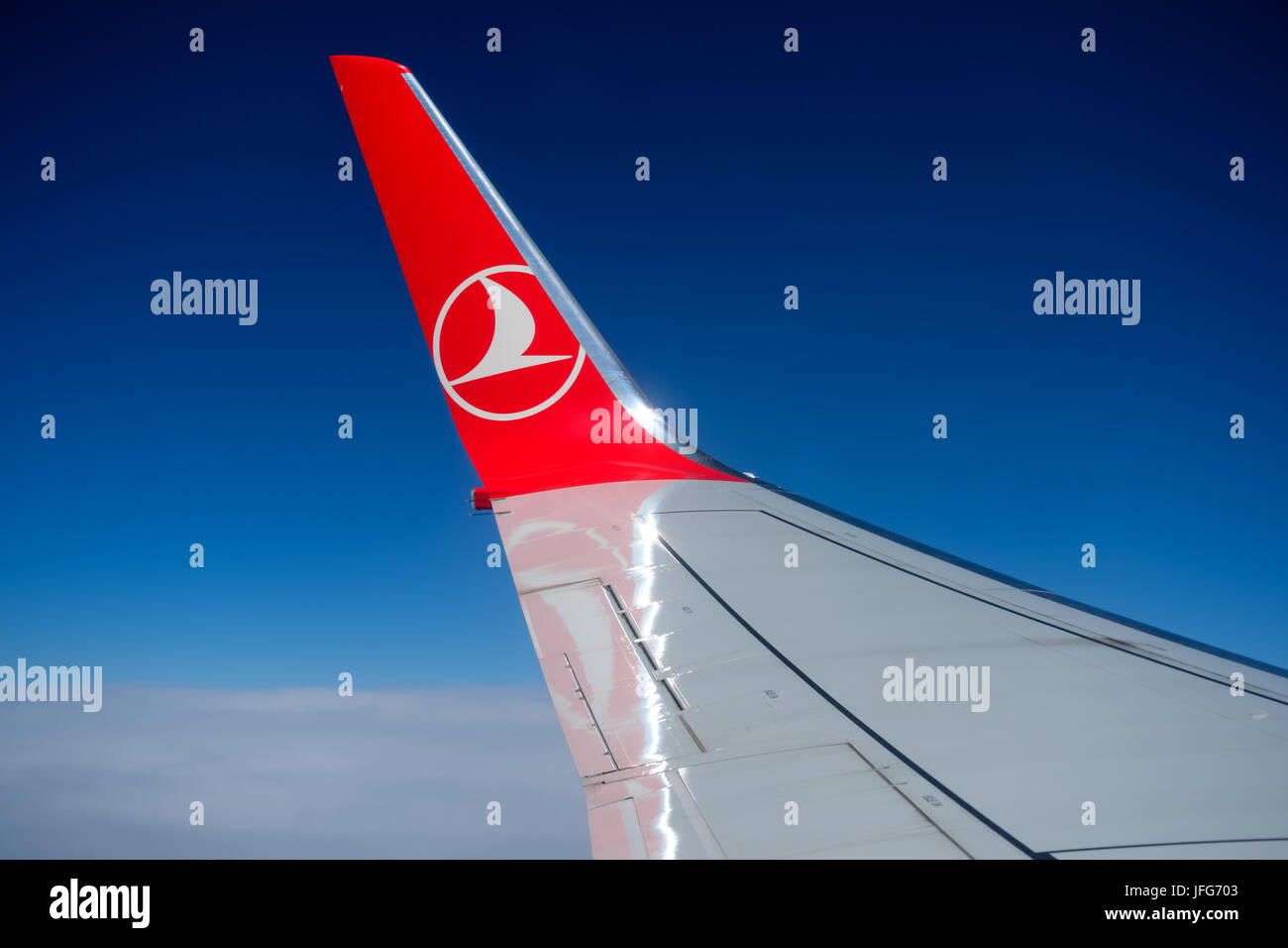 Turkish Airlines airplane wing above the clouds Stock Photo - Alamy