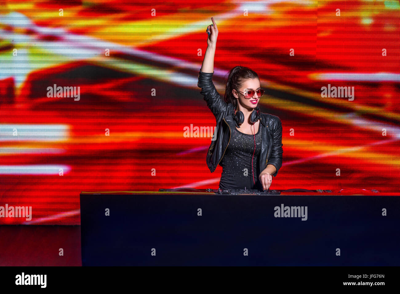 Smiling girl dj Stock Photo - Alamy