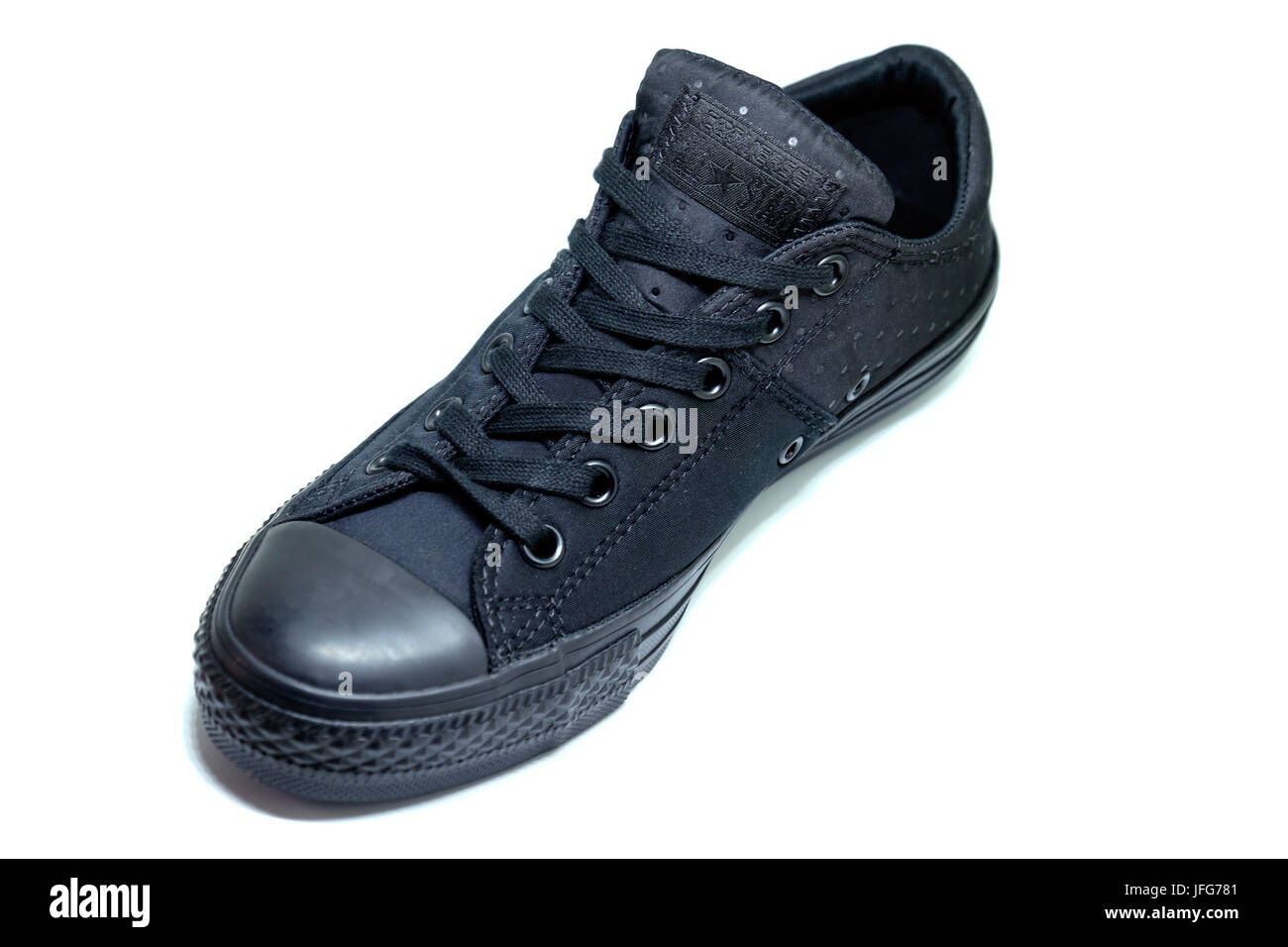 Black converse shoe Cut Out Stock Images & Pictures - Alamy