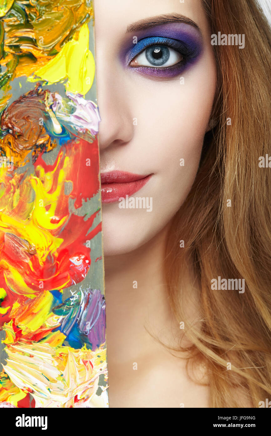 Young woman painter with color palette Stock Photo - Alamy