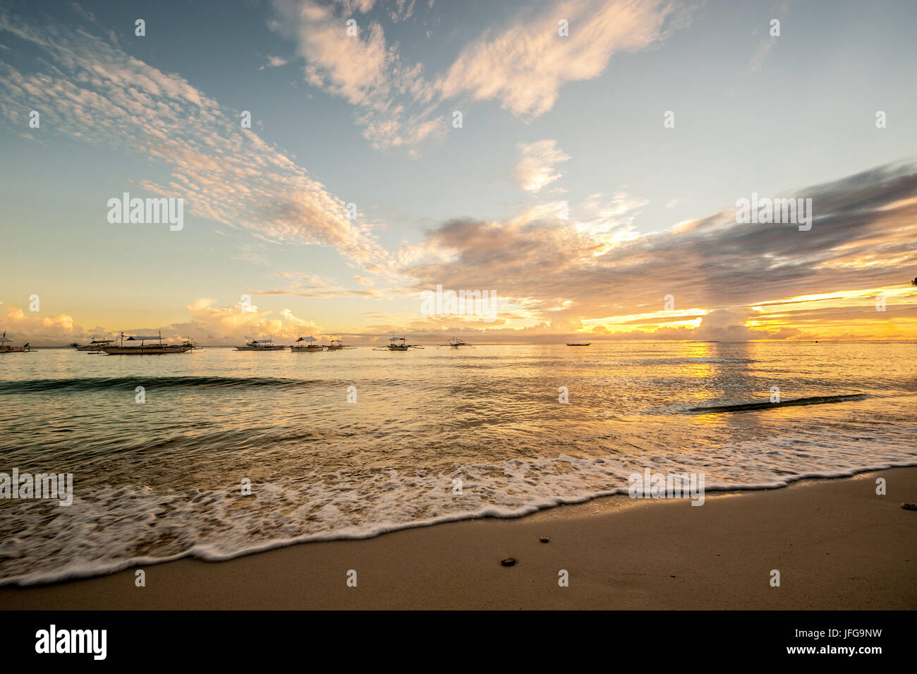 Tropical beach sunset at Philippines Stock Photo - Alamy