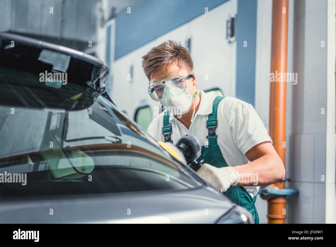 Mechanic works in professional auto hi-res stock photography and images ...