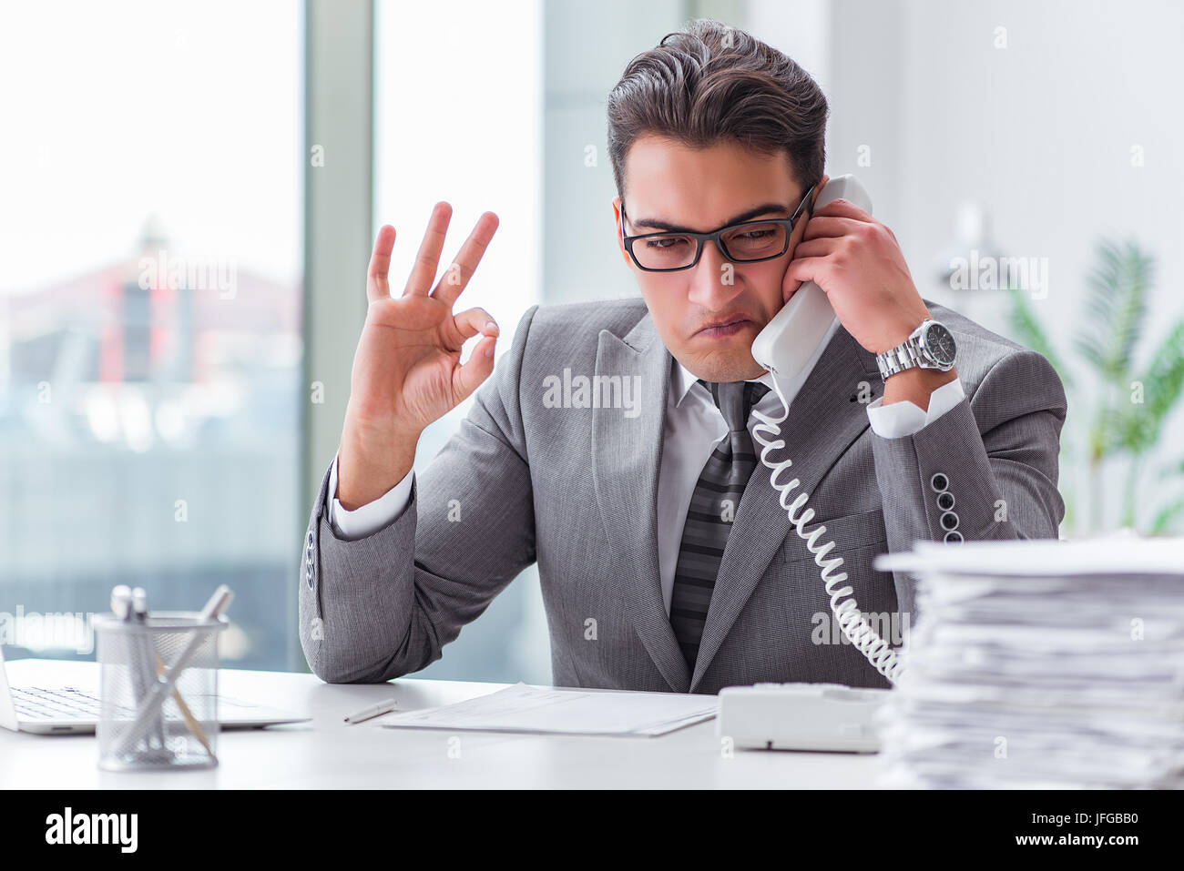 Call center operator talking on the phone Stock Photo - Alamy