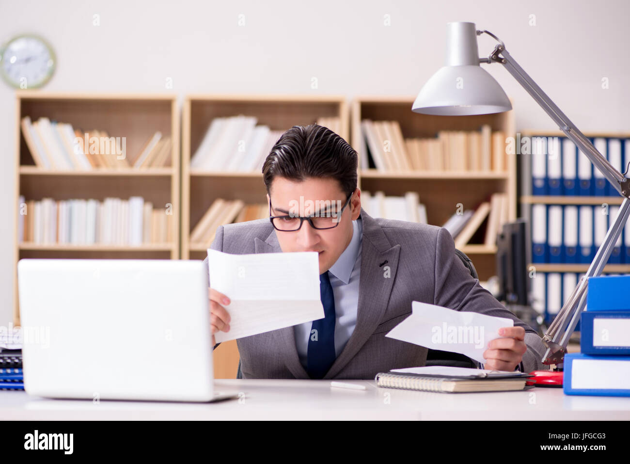 Businessman receiving letter in the office Stock Photo - Alamy