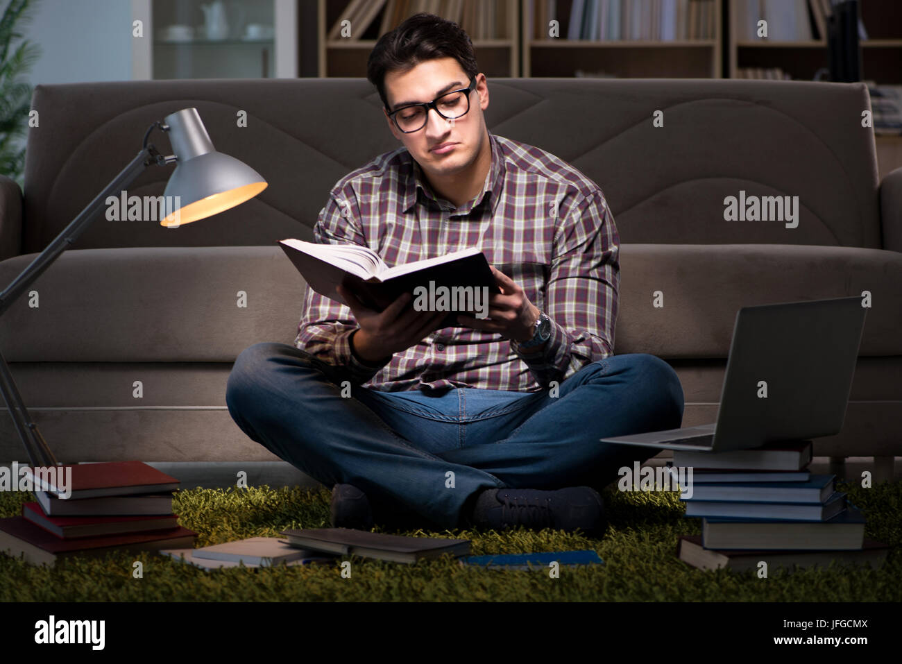 Student reading books preparing for exams Stock Photo - Alamy