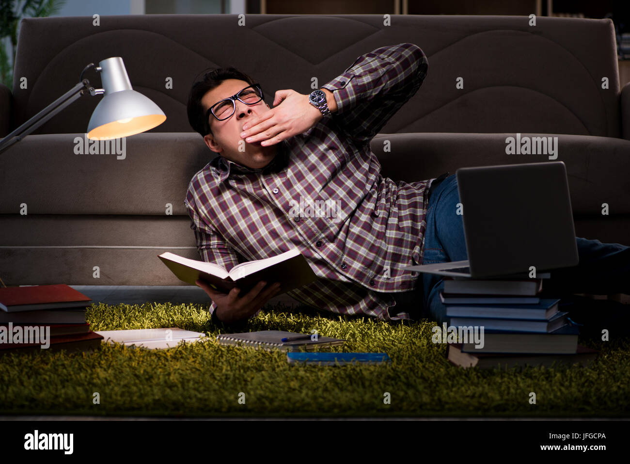 Student reading books preparing for exams Stock Photo - Alamy