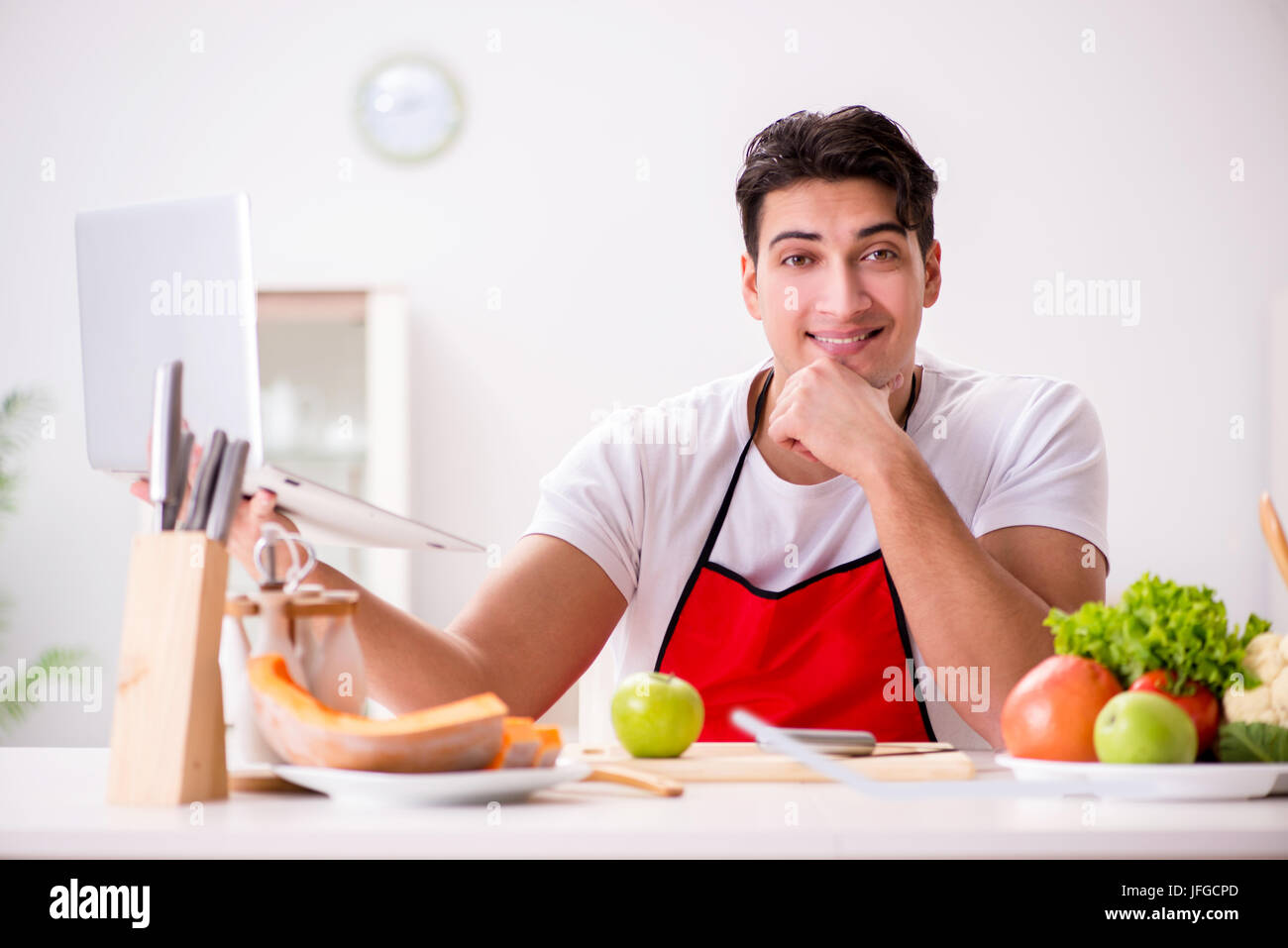 Funny man cook working in the kitchen Stock Photo - Alamy