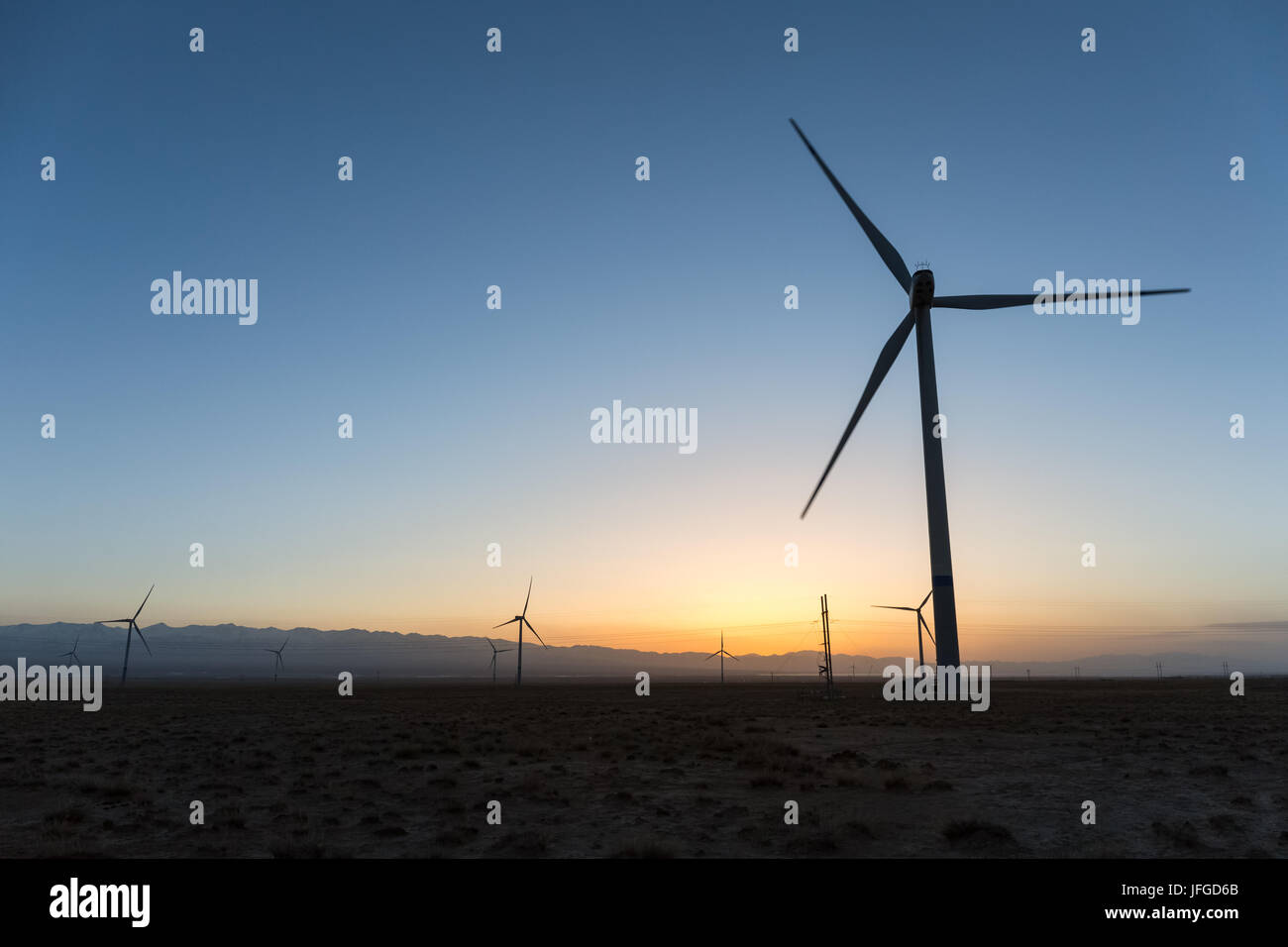 wind farm in sunset Stock Photo - Alamy