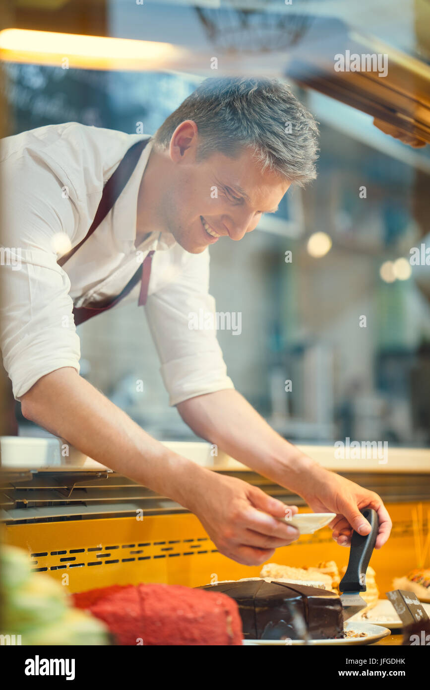 Male owner working bakery hi-res stock photography and images - Alamy