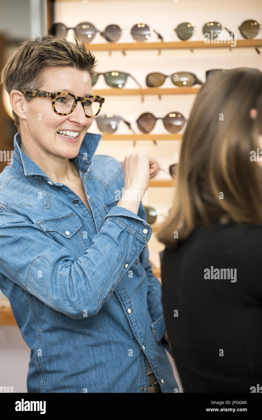 friendly service at the optometry Stock Photo - Alamy