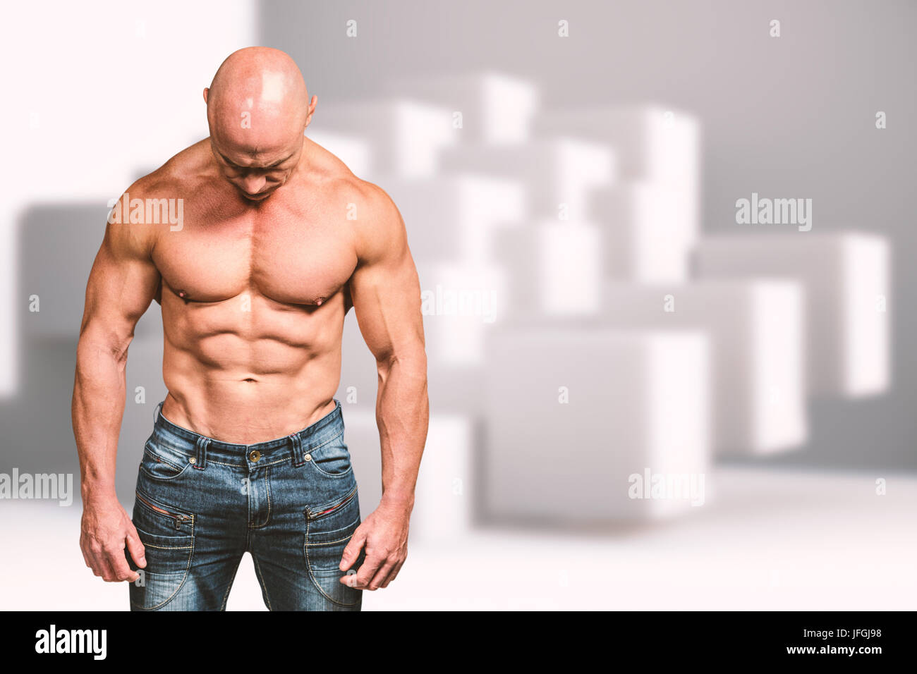 Composite image of muscular sad man looking down Stock Photo - Alamy