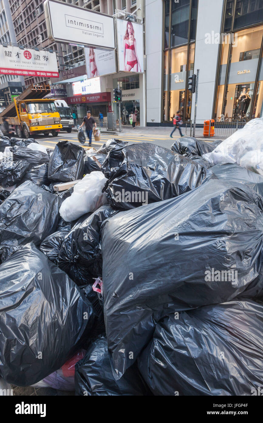 China, Hong Kong, Refuse Sacks Waiting Collection Stock Photo - Alamy