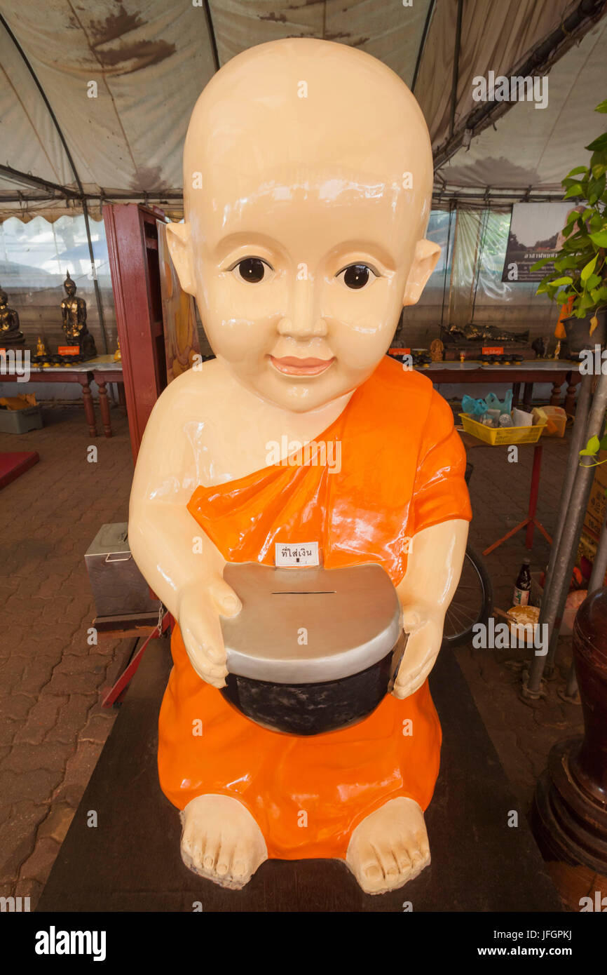 Temple donation box depicting monk hold alms bowl hi-res stock ...