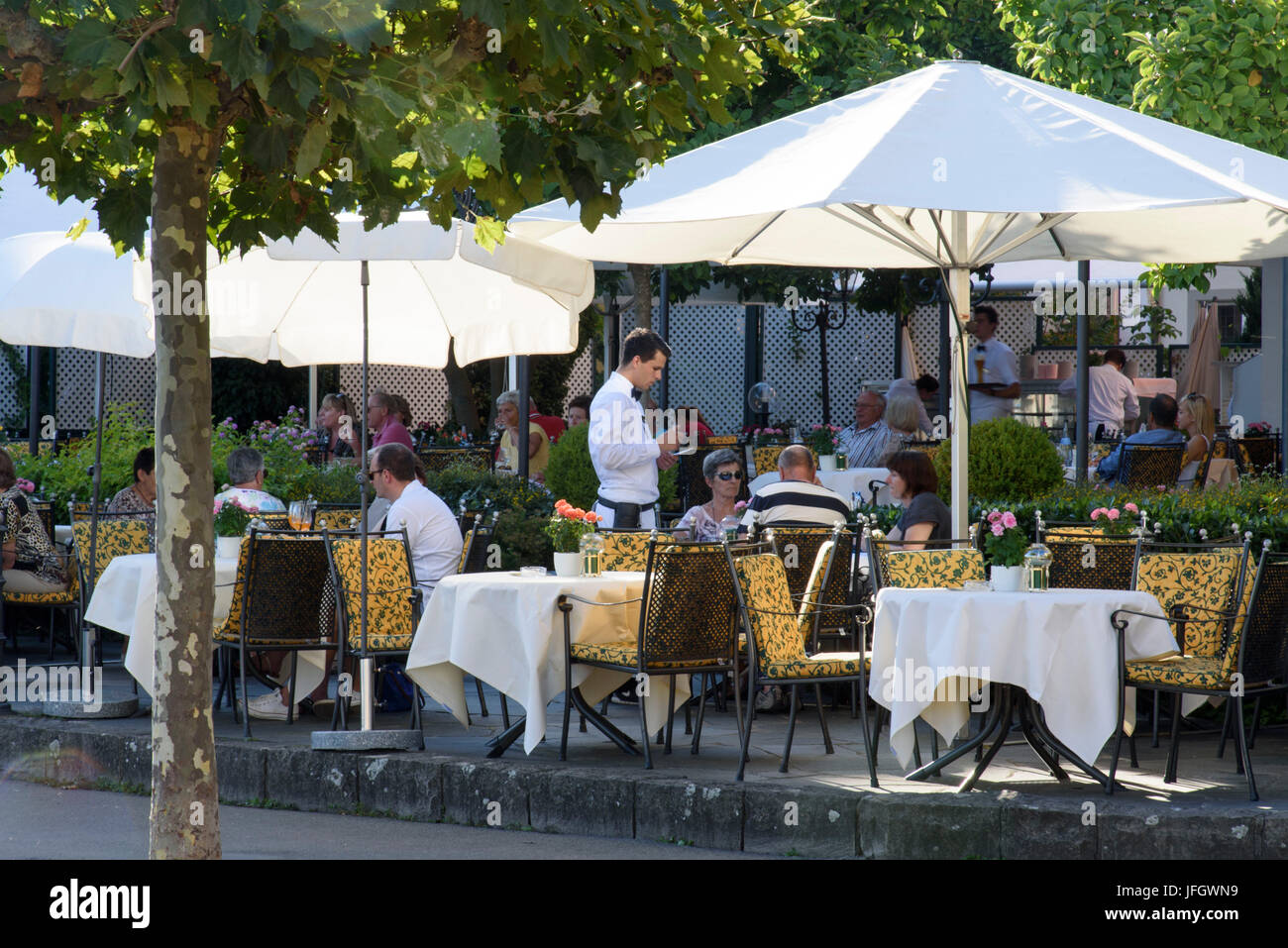 Restaurant in the harbour of Lindau, Lake of Constance, Bavarians ...