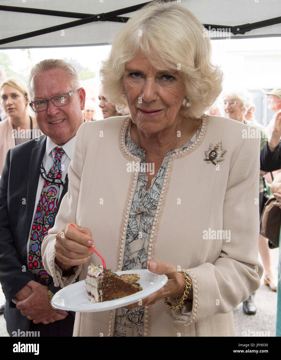 The Duchess of Cornwall eating cake during her visit to Wellington ...