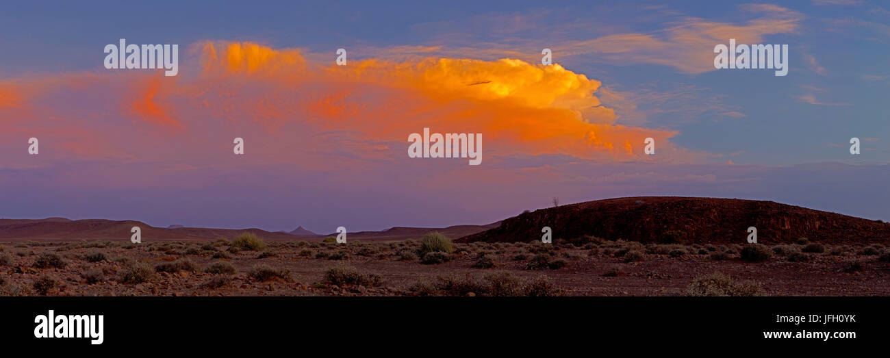 weather-beaten coloured stone hills with growth, evening beautyful ...