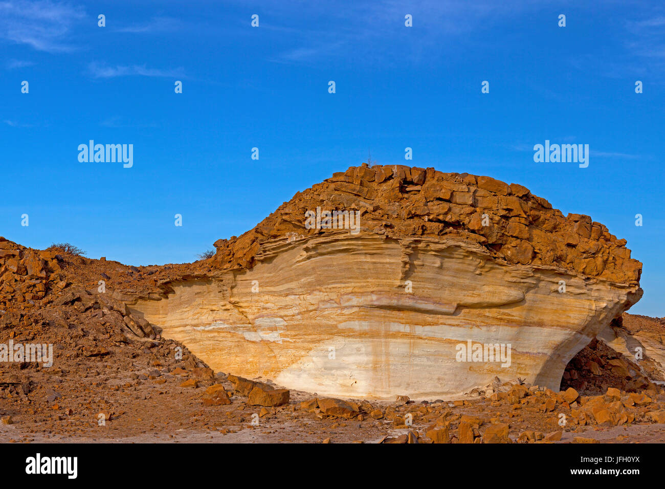 weather-beaten coloured sandstone rocks, beautyful clouds, Damaraland ...