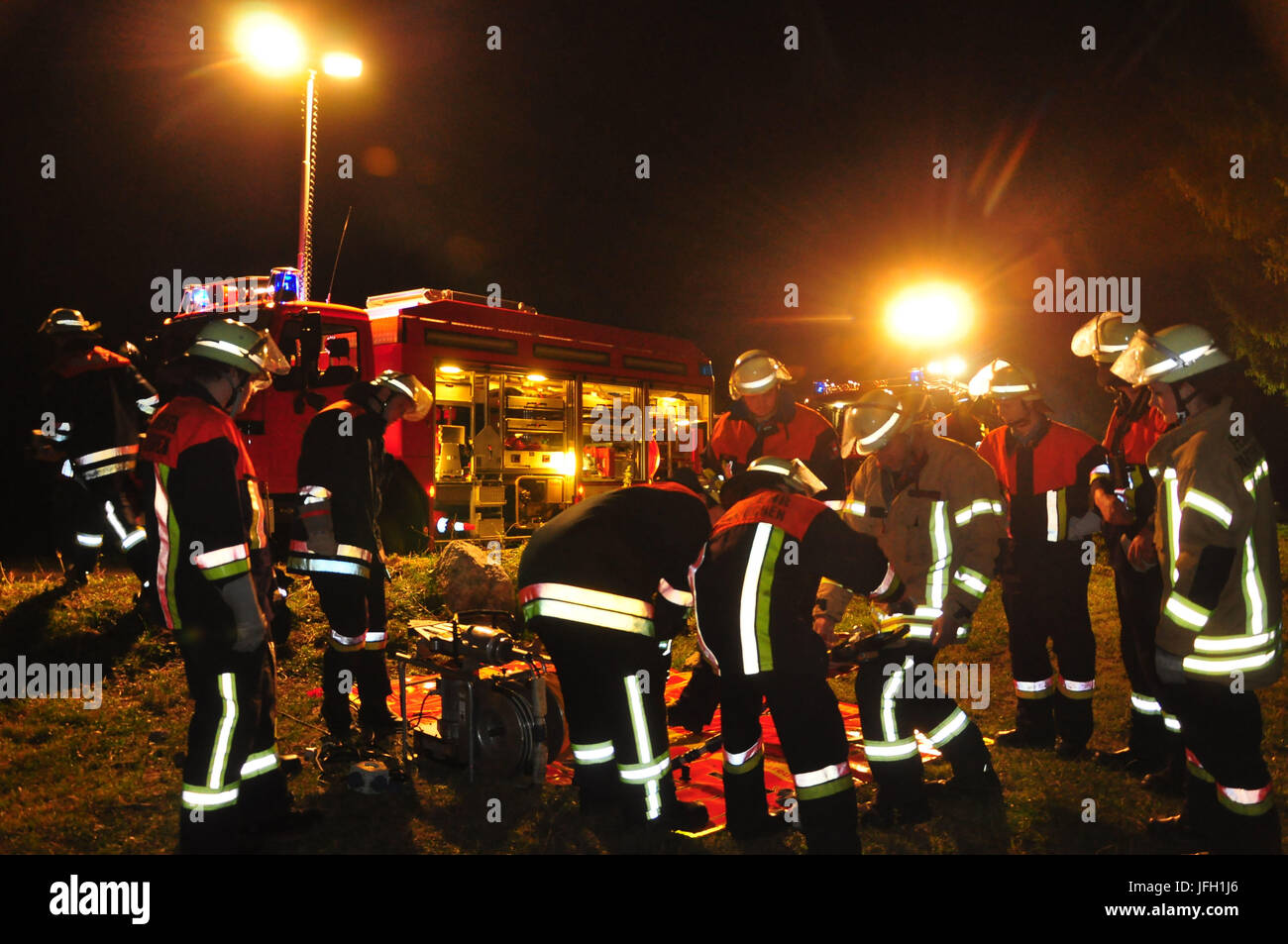Fire brigade, rescue entry, at night Stock Photo - Alamy
