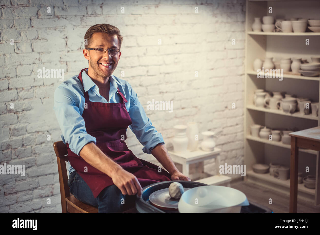 Happy potter hi-res stock photography and images - Alamy