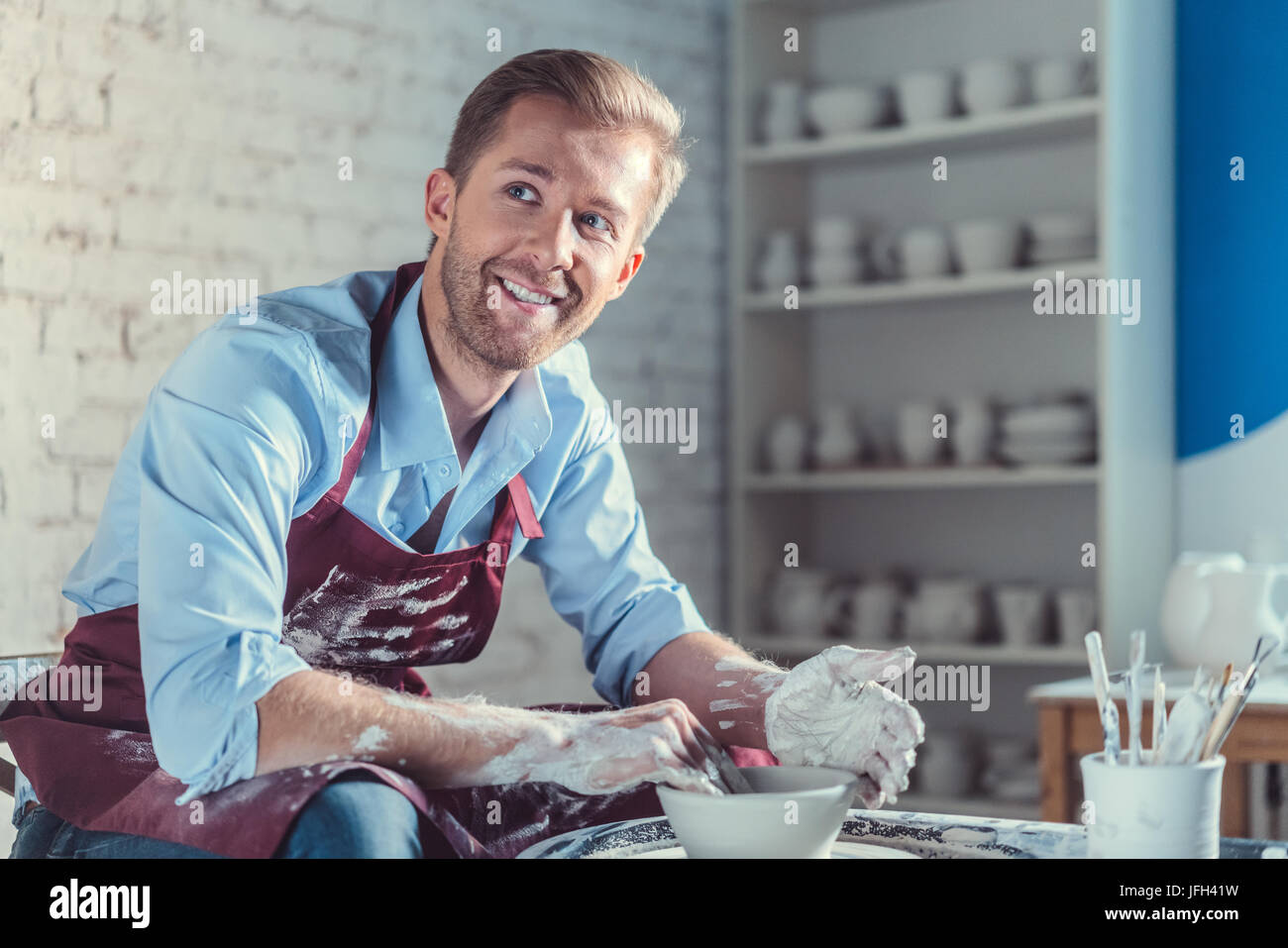 Happy potter hi-res stock photography and images - Alamy