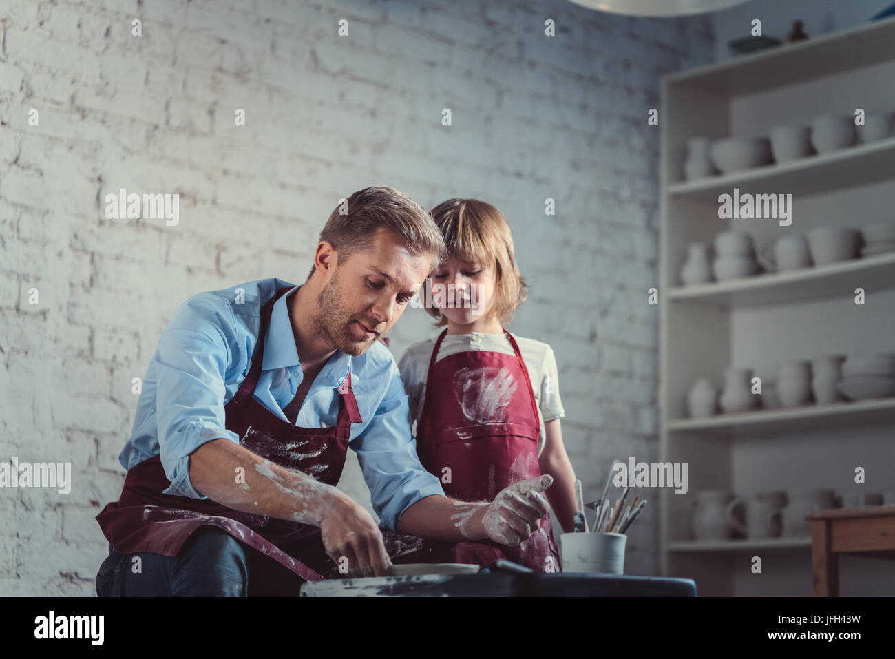 Pottery Work Father Son High Resolution Stock Photography and Images ...