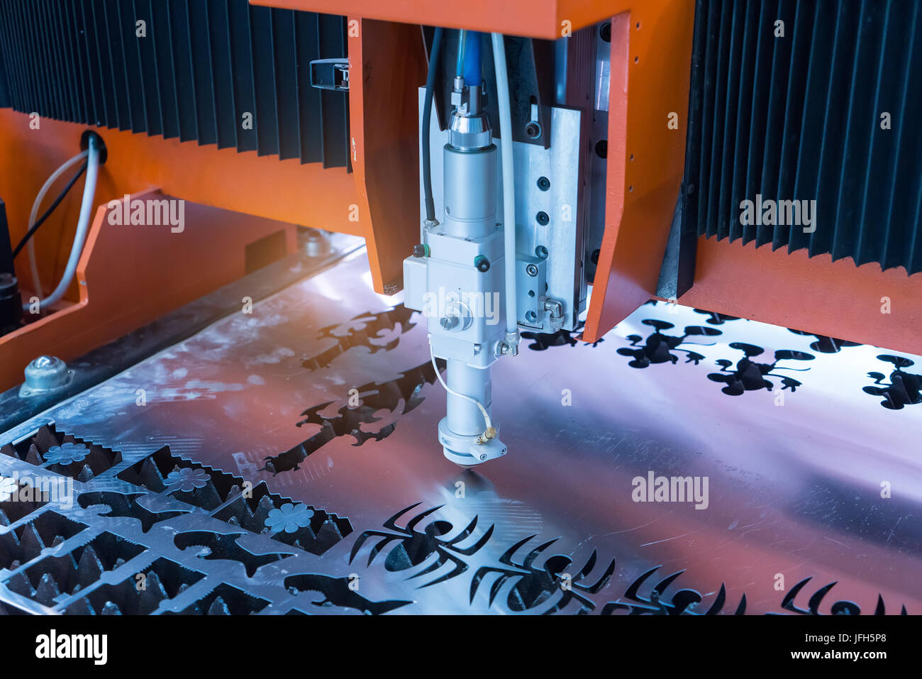 laser CNC cut machine while cutting the sheet metal Stock Photo - Alamy