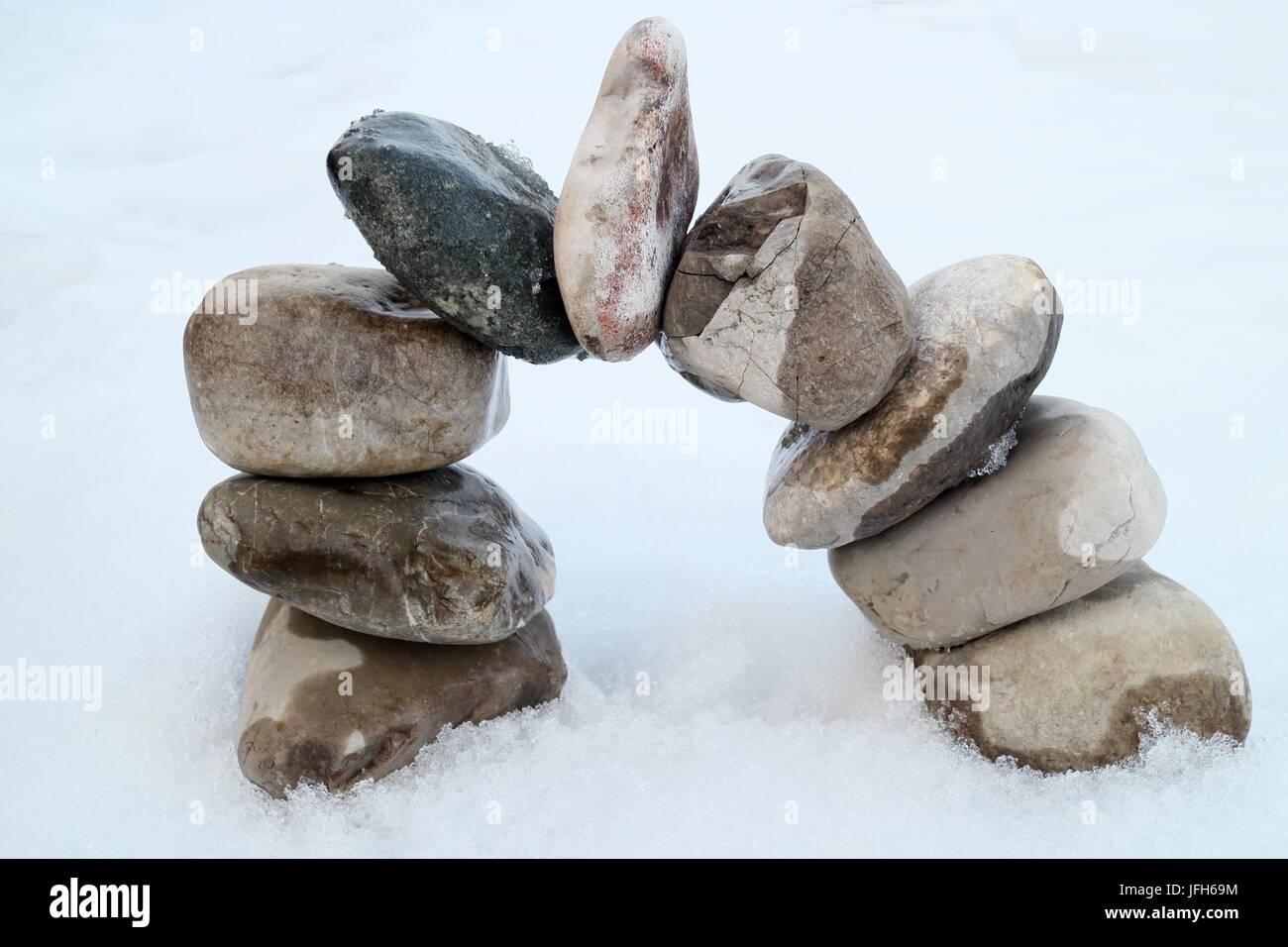 stone bow in the snow Stock Photo - Alamy