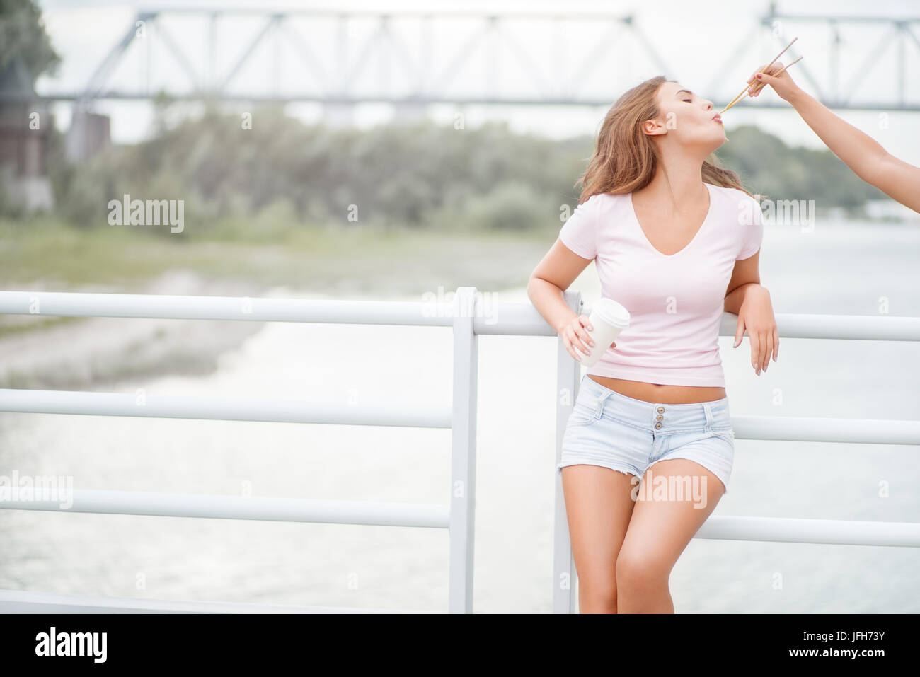 Girl paper eating hi-res stock photography and images - Alamy