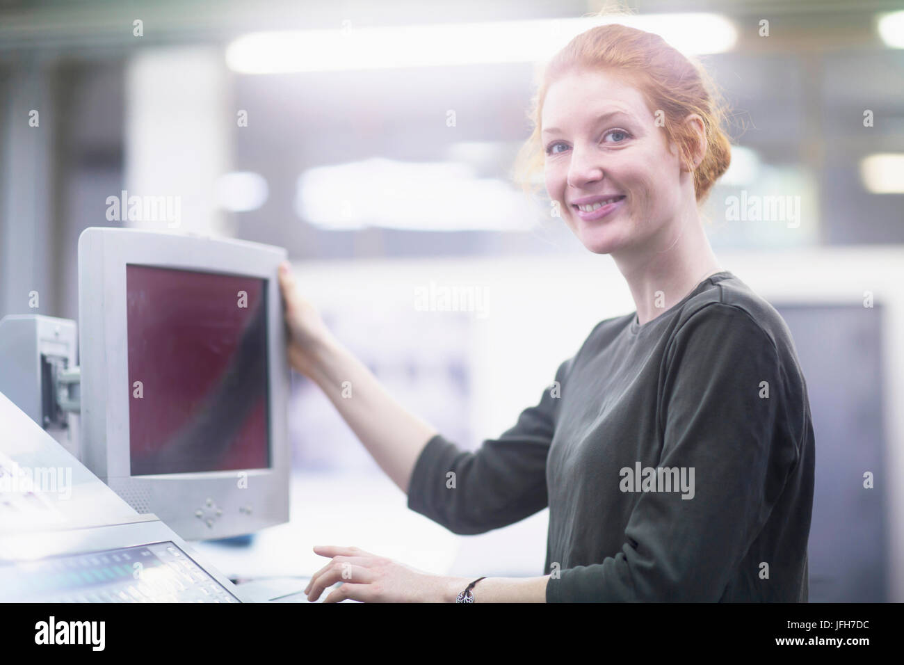 Portrait of print worker holding photocopier Stock Photo - Alamy