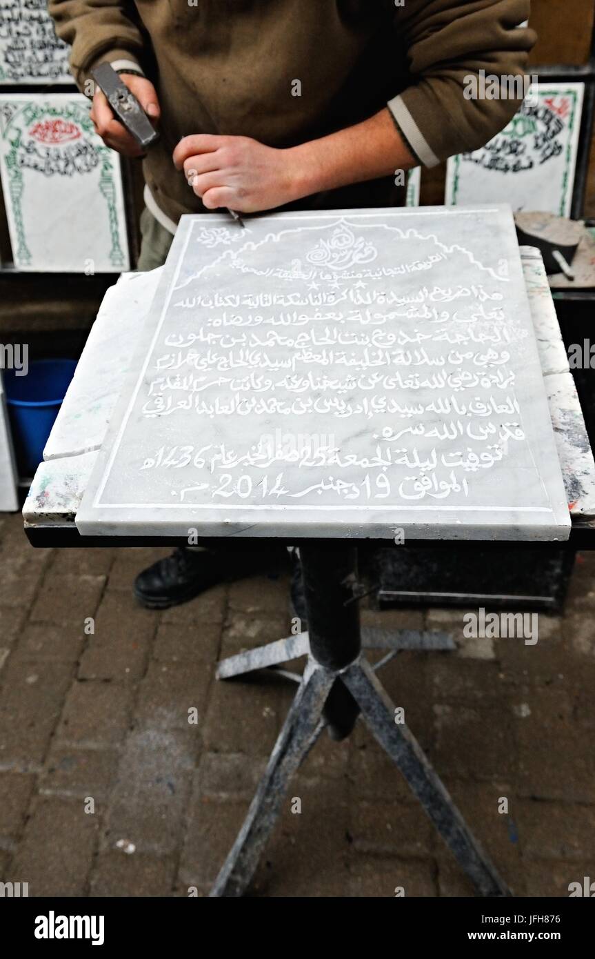 Making a marble board in the Medina Fez Stock Photo - Alamy