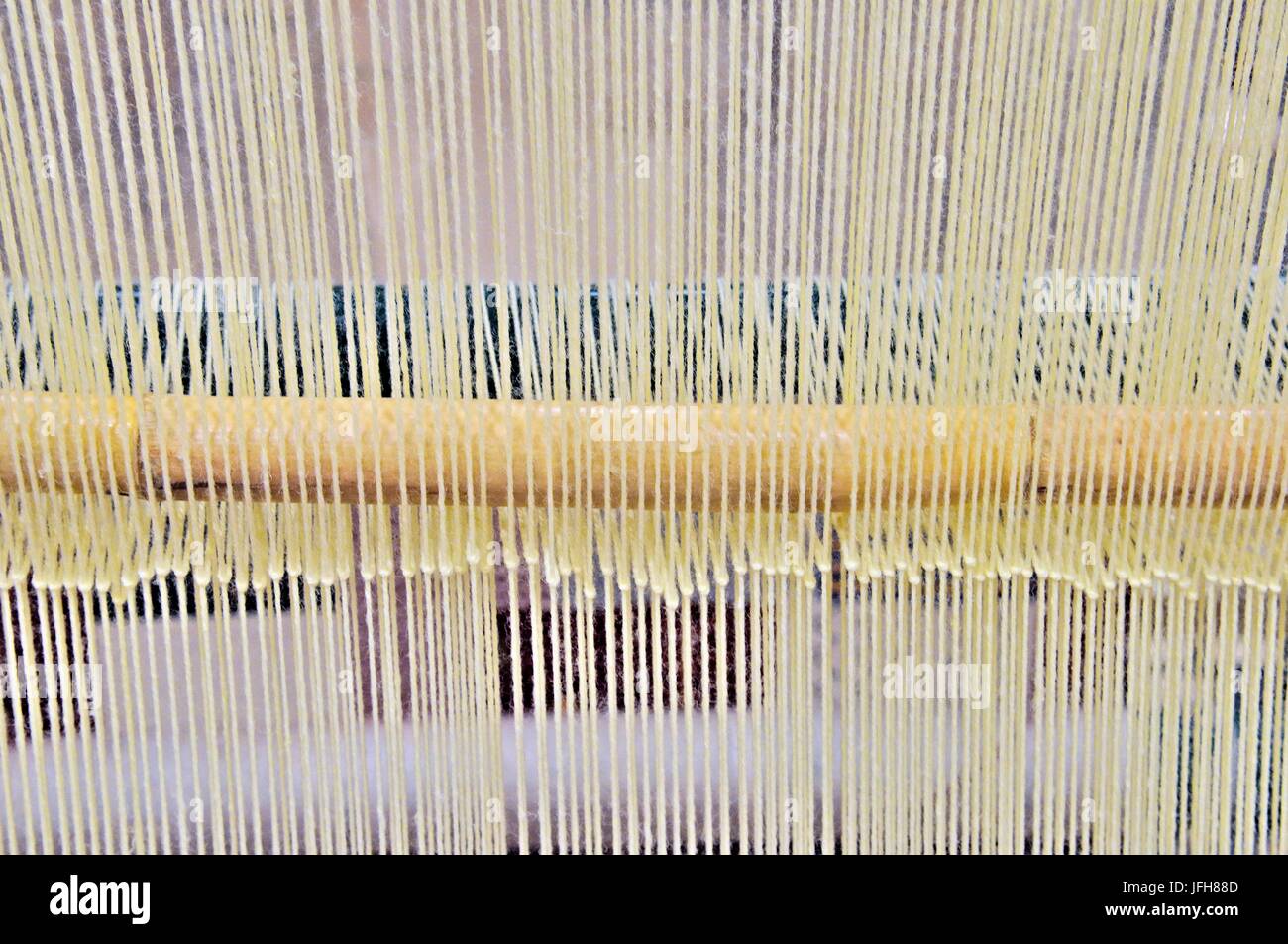 Thread in the loom Stock Photo - Alamy