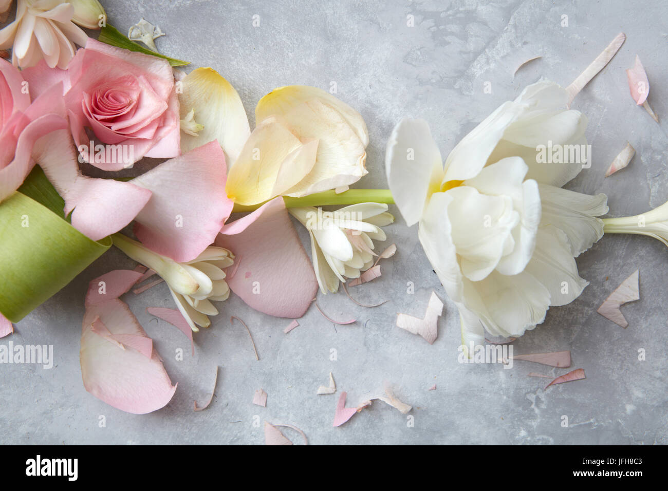 Composition of flowers on grey background Stock Photo - Alamy