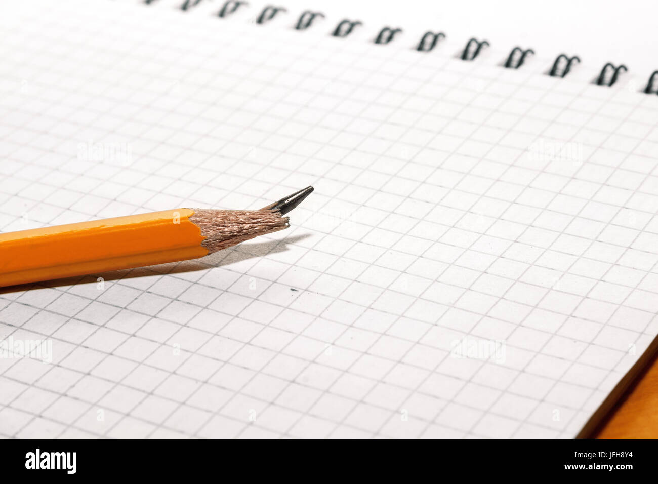 Broken pencil and notebook Stock Photo - Alamy