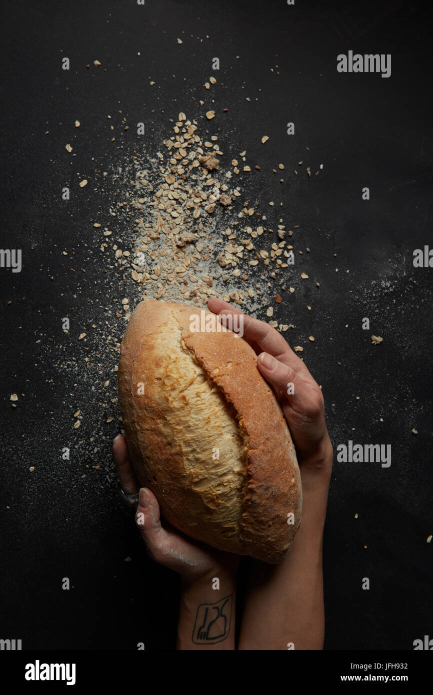hands with a bread Stock Photo - Alamy