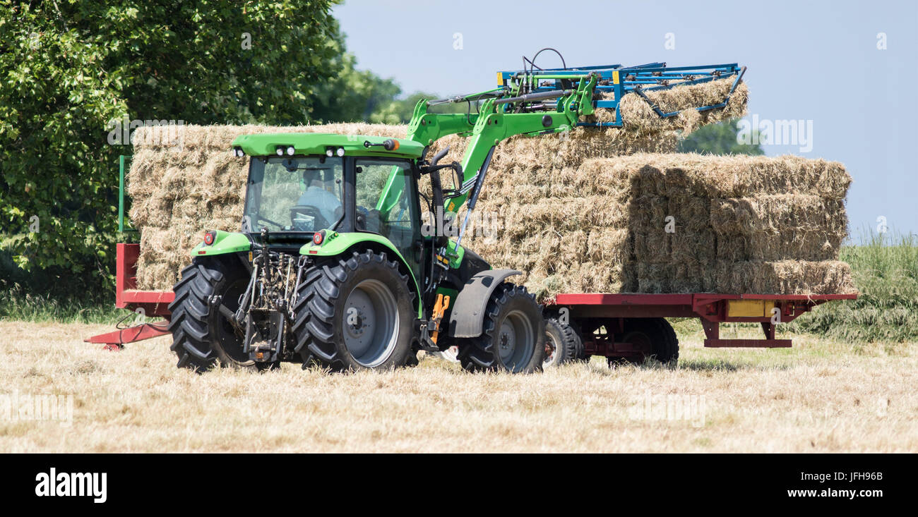 Tractor trailer harvesting crop hi-res stock photography and images - Alamy