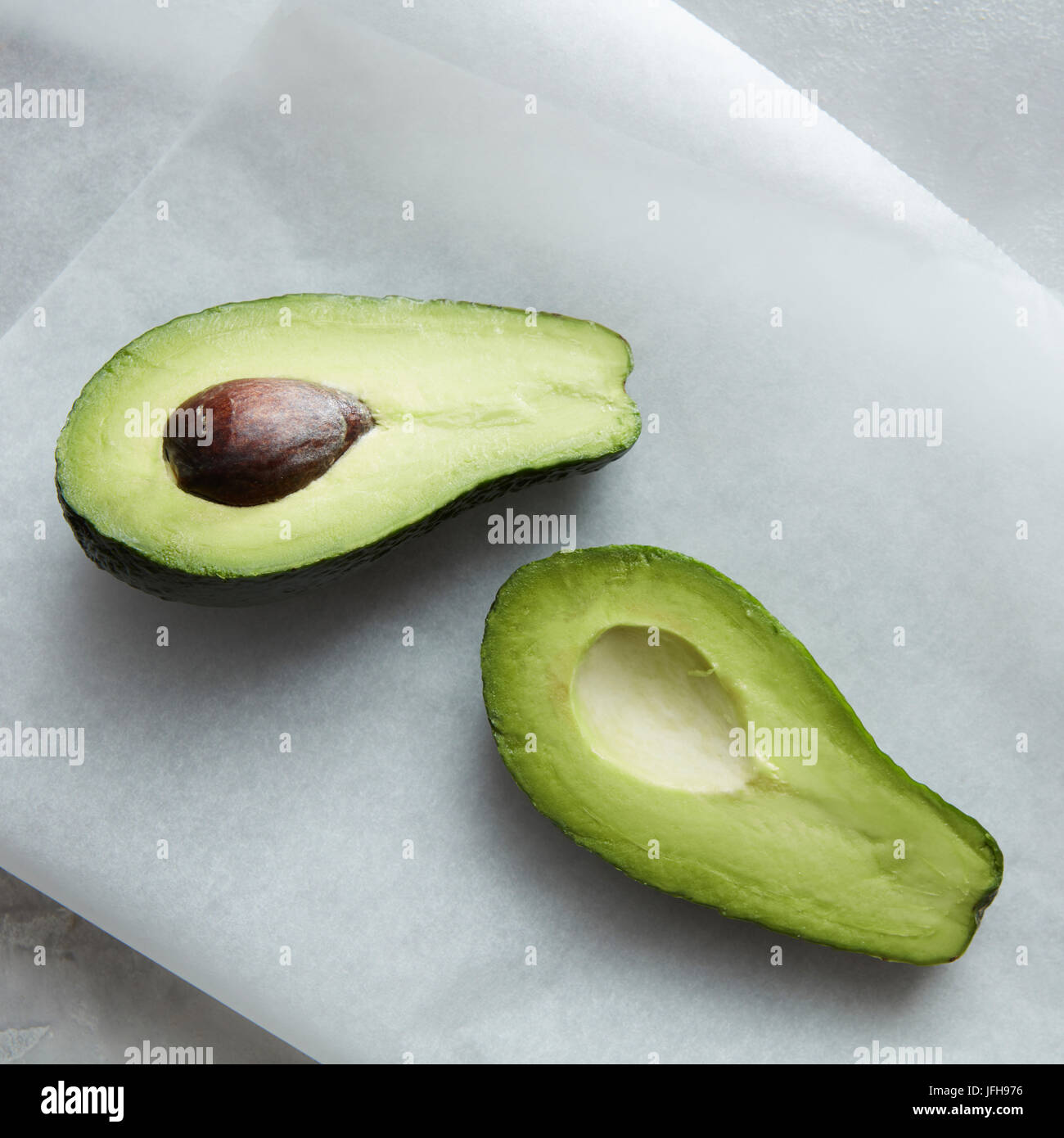 Fruit avocado on table Stock Photo - Alamy