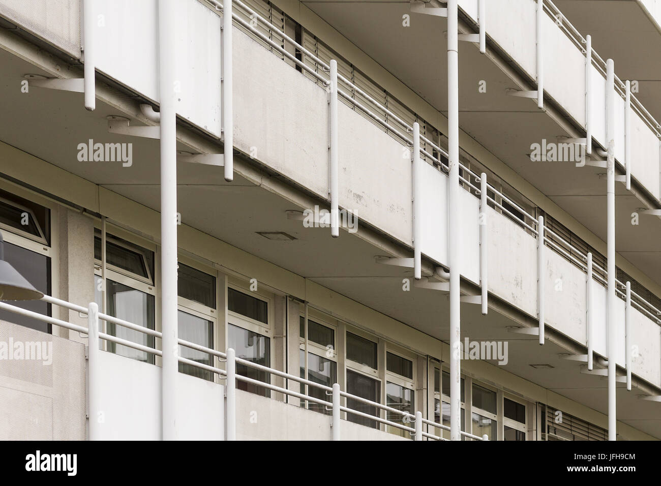 House facade with continuous balconies Stock Photo - Alamy